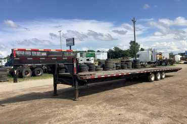 1996 Bell 40’ Flatbed Tri-Axle Gooseneck Trailer - Repo Finder