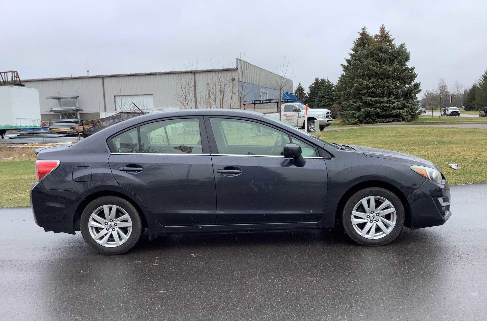 2015 subaru Impreza 2.0i Premium PZEV Sedan 4-DR - Repo Finder